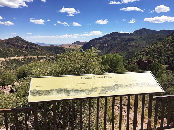 An interpretive sign shares the story of Chase Creek, while the dramatic backdrop steals the show.