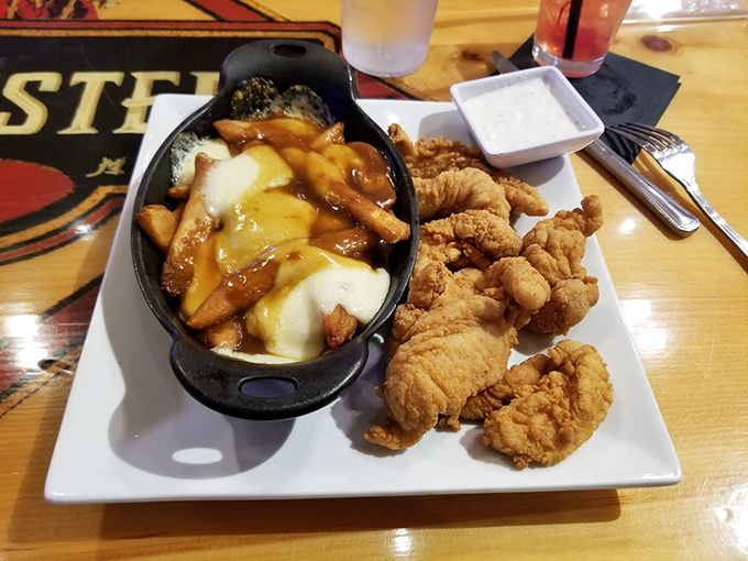 These aren't just chicken tenders - they're crispy golden tickets to comfort food heaven, served with a side of pure joy.