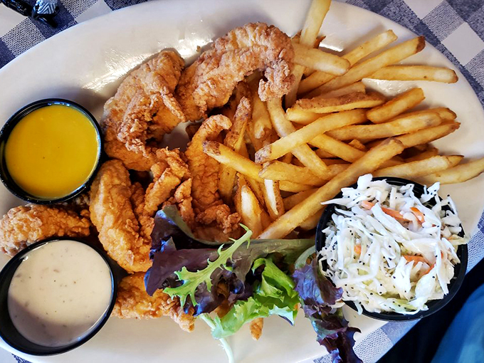 Crispy, golden tenders with fresh-cut fries and coleslaw - because sometimes even seafood lovers need a break.
