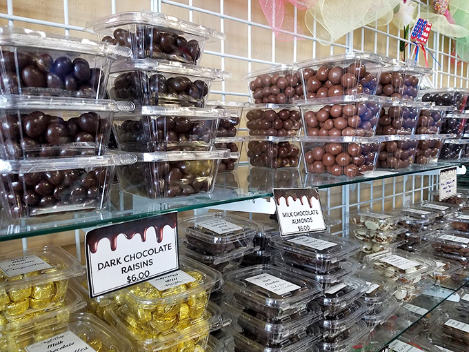 Chocolate Display Chocolate roulette, anyone? From dark chocolate raisins to milk chocolate almonds, every choice is a winner in this sweet game.