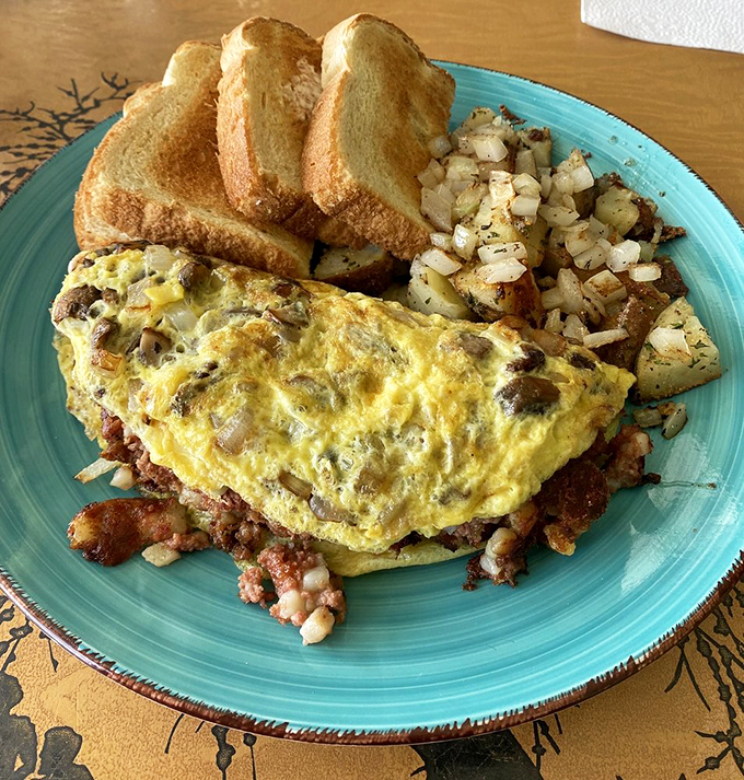 This omelet didn't just break free from breakfast conventions &ndash; it revolutionized them with corned beef and melted cheese.
