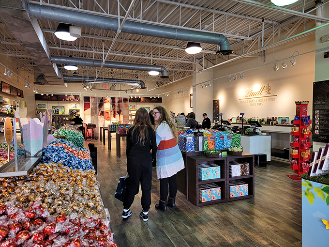 Chocolate shopping: the ultimate bonding experience. These two are clearly planning their sweet escape from reality.