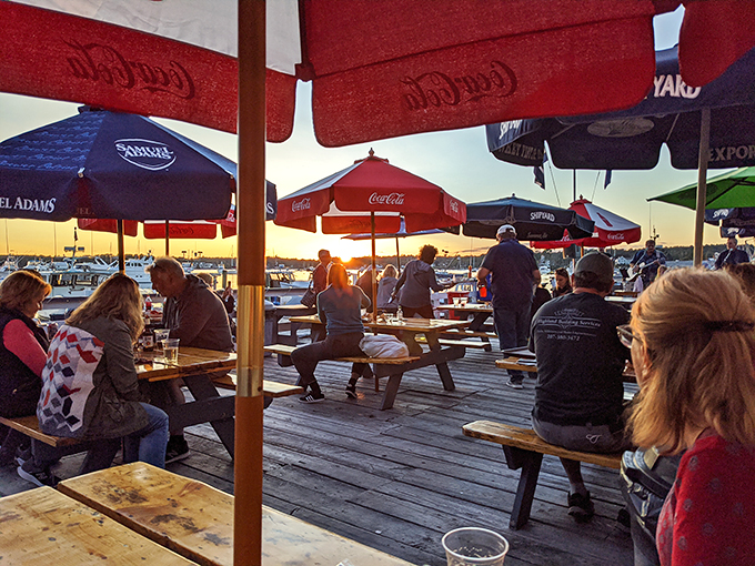 Sunset dining at its finest. The only thing more colorful than these umbrellas? The stories being shared over steaming plates of seafood.