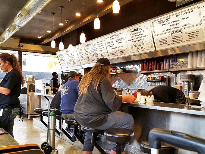 Where strangers become friends over shared love of good grub. It's like "Cheers," but with more mustard stains.