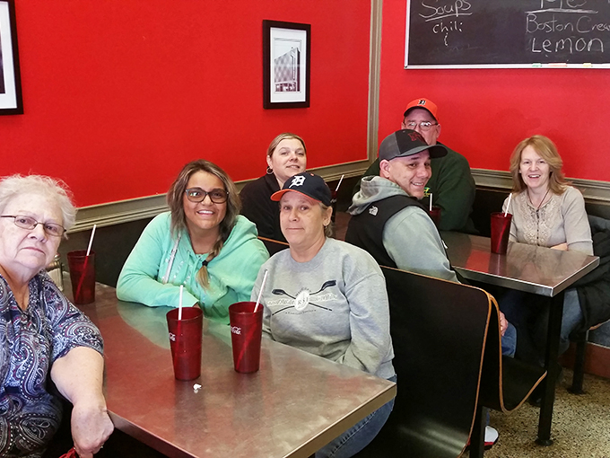 Happiness is contagious! These diners look like they've stumbled upon the secret to eternal breakfast bliss.