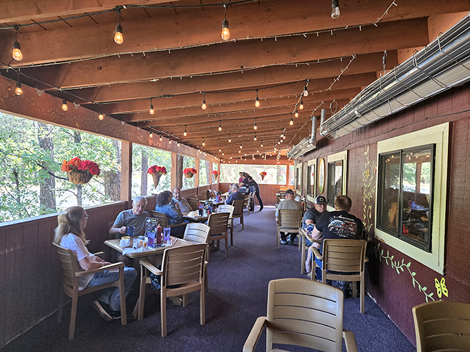 Happy diners, twinkling lights, and the promise of good eats. It's like Cheers, but with better breakfast and pine-scented air.