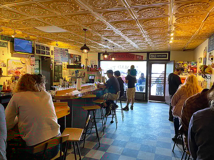 Happiness is a full belly and a bustling taqueria. The Mad Taco's lively atmosphere is as satisfying as its mouthwatering menu.