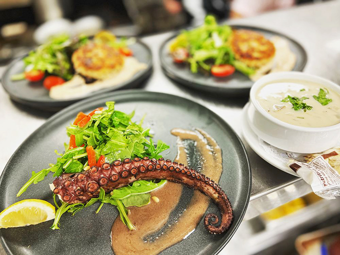 Perfectly charred octopus tentacle curled elegantly on the plate &ndash; it's seafood that makes a statement.