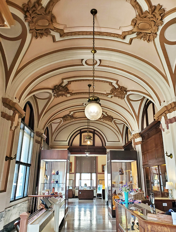 Welcome to the Sistine Chapel of ceramics! This hallway's ceiling is so ornate, Michelangelo might have considered a career change.