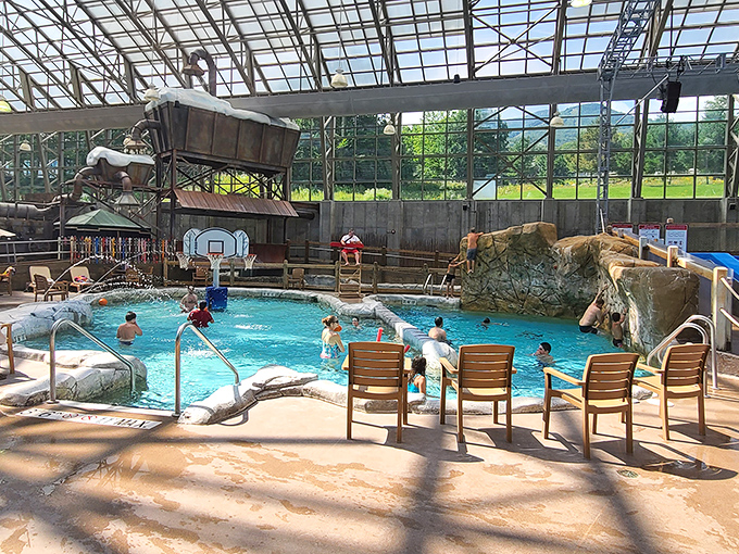 The kids' play area features gentle sprays and shallow waters, proving paradise comes in all depths and sizes.