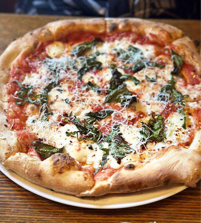 Basil, tomato, and cheese, oh my! This Margherita pizza is proof that sometimes, the simplest things in life are the yummiest.