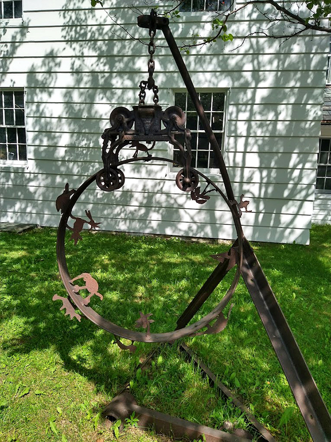 Hang in there! This whimsical contraption looks like it escaped from Willy Wonka's art department.