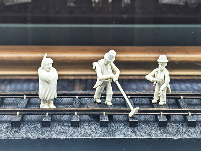 It's a small world after all! These tiny figures bring the bustling world of railroads to life in miniature.