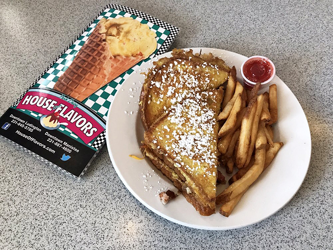 The Monte Cristo: where breakfast and lunch collide in a powdered sugar snowstorm. It's like French toast and a ham sandwich had a beautiful, syrup-drenched baby.