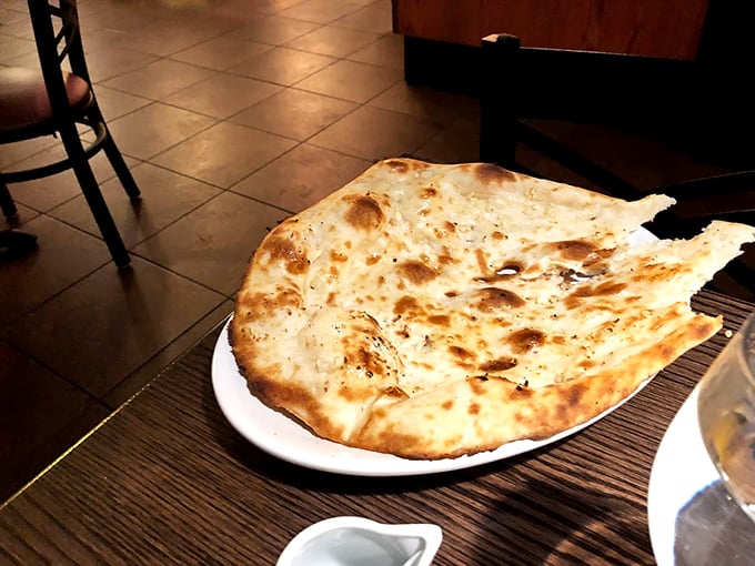 Pillowy naan bread with perfect char marks &ndash; nature's perfect utensil for scooping up every last drop of curry. Photo credit: 卢雅莉