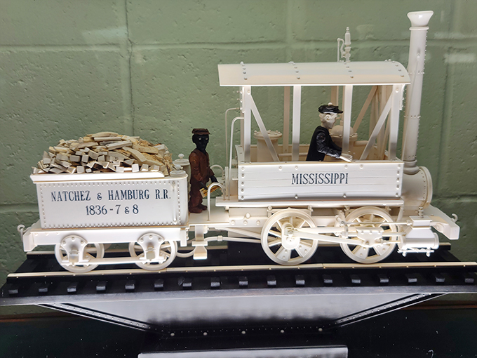 All aboard the time machine! This miniature masterpiece takes us back to 1836, when trains were new and carving was an art form.