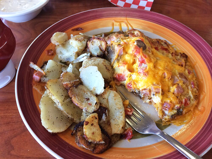 Comfort food that's anything but pedestrian. This hearty plate of cheesy goodness and seasoned potatoes is like a warm hug for your taste buds.