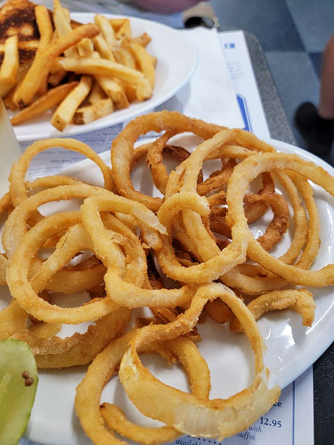 These onion rings aren't just crispy, they're wearing golden halos. Someone's grandma definitely had a hand in this recipe.