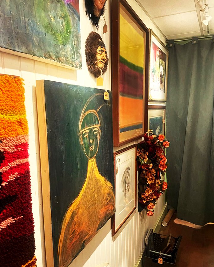 Art attack! This eclectic wall is like a visual potluck where Picasso, your quirky neighbor, and a summer camp craft project all contributed.