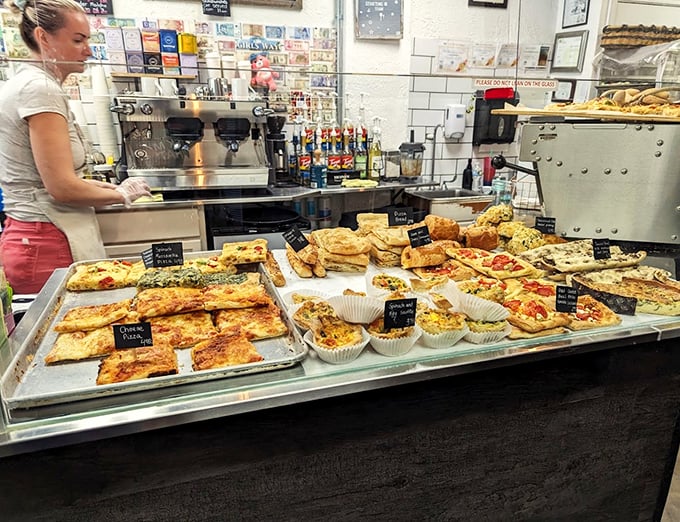 A savory showcase where quiche and pizza squares compete for your attention, and everyone's a winner.