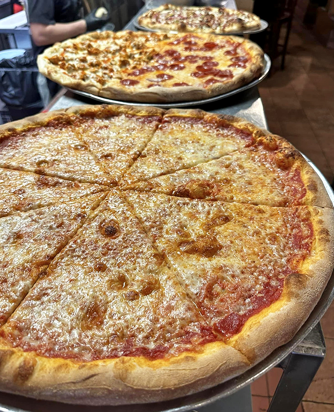 Pizza perfection in triplicate. It's like the holy trinity of circular deliciousness.