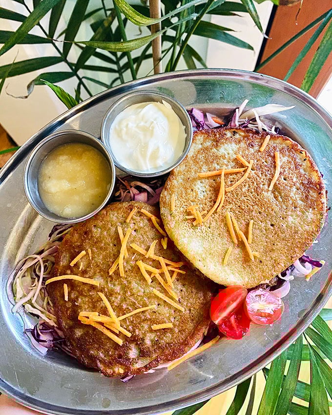 Crispy, golden potato pancakes served with classic accompaniments - comfort food elevated to an art form.