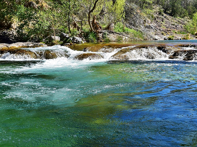 Verde River's rushing waters carve through the landscape, creating an oasis where desert meets whitewater.