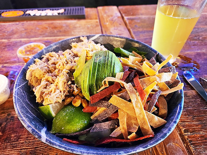 Fresh avocado and pulled meat create a protein-packed fiesta, proving salads don't have to be boring.