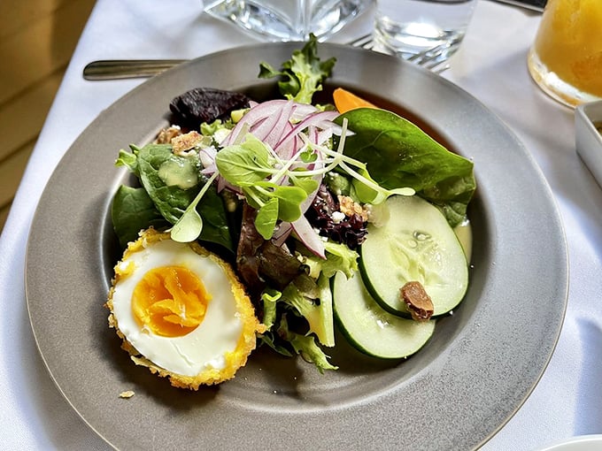 A salad that's both a work of art and breakfast? That crispy-coated egg is living its best life. 