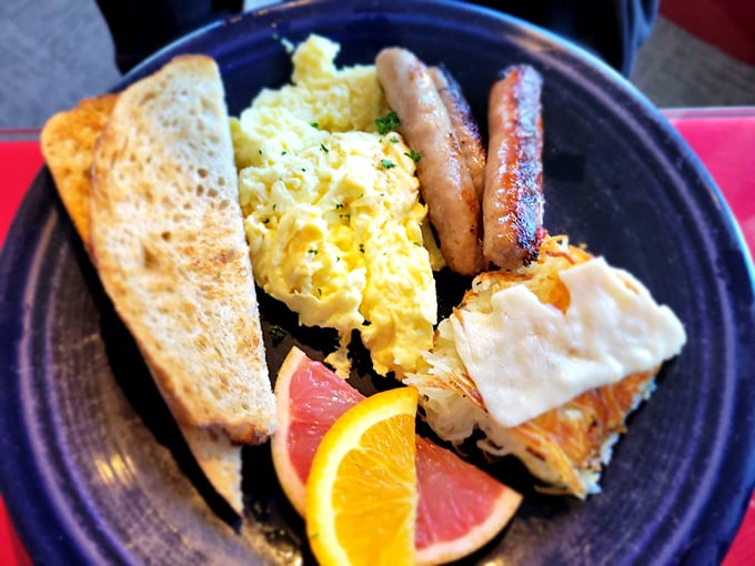 The holy trinity of breakfast: perfectly scrambled eggs, crispy hash browns, and toasty sourdough. It's the morning trifecta!