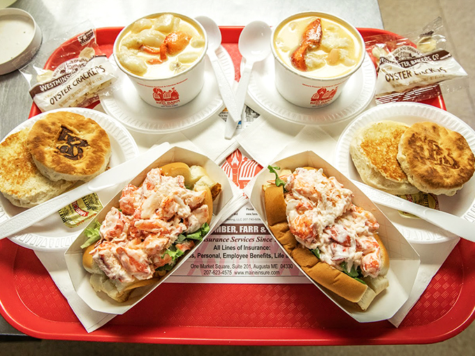 A seafood spread that says "Welcome to Maine" - lobster rolls, creamy chowder, and buttery biscuits make a perfect trio.