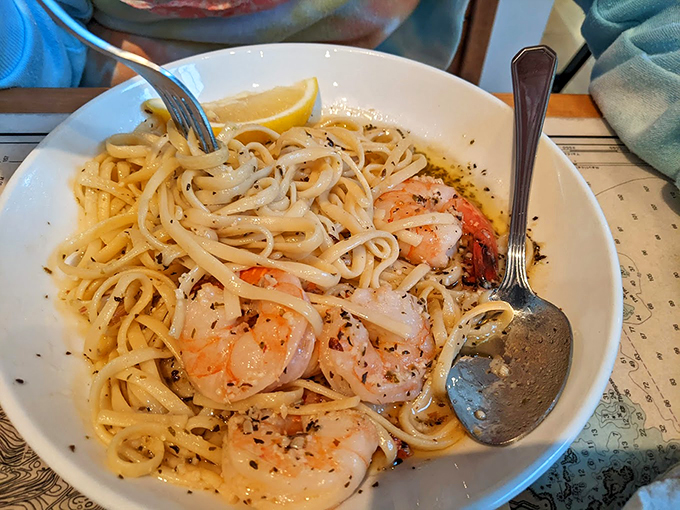 Shrimp scampi that's doing the backstroke in garlicky, buttery paradise - proof that pasta can make you weak in the knees. Photo credit: Sayed Iftekhar
