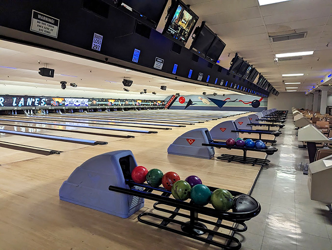 Perfectly maintained lanes stretch into the distance, each one holding the promise of that elusive perfect game.