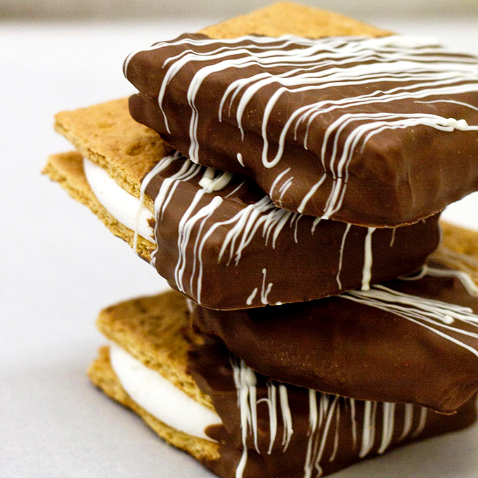 S'mores gone wild! Cerreta's takes campfire treats to new heights with these chocolate-draped delights. No campfire required!