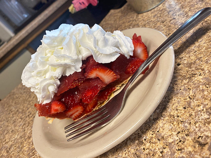 Red alert! This strawberry pie is so vibrant, it could stop traffic. Each bite is like a summer day wrapped in a flaky crust. Photo credit: Beeline Cafe
