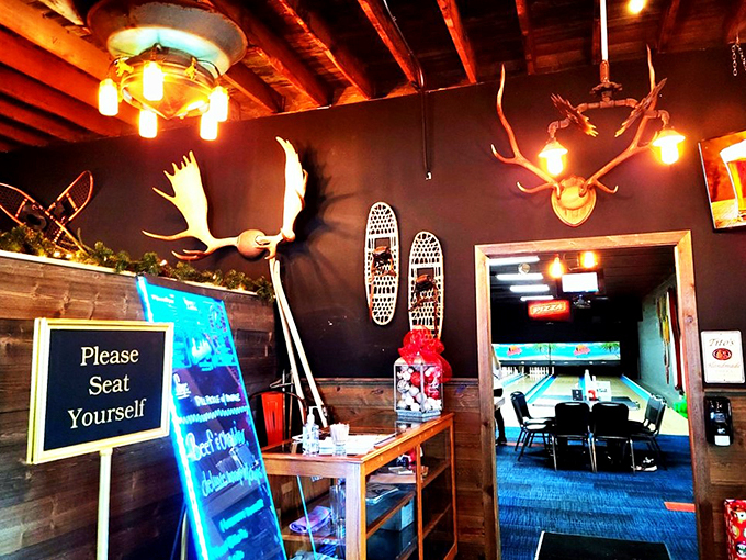 Where antler chandeliers meet bowling lanes - because why choose between rustic charm and retro fun?