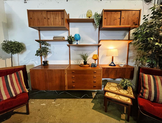 This wall unit is the Swiss Army knife of furniture. It's got more compartments than a magician's top hat!