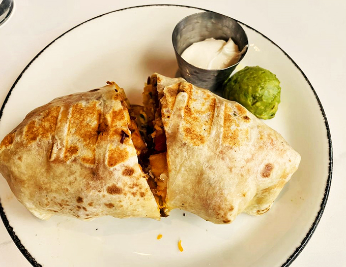 This isn't just any breakfast burrito—it's a masterpiece of morning engineering, grilled to golden perfection.