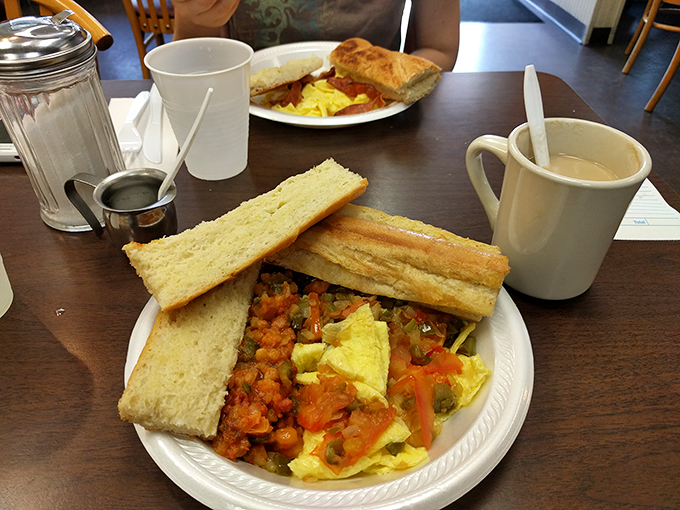 Coffee and breakfast: the dynamic duo that gets you moving. This spread is like a good morning hug for your stomach. Photo credit: Jimmy Ruska