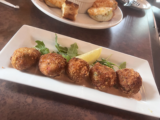 Crispy, golden, irresistible! These conch fritters are the beach vacation your taste buds have been dreaming of &ndash; no sunscreen required. Photo credit: Ron