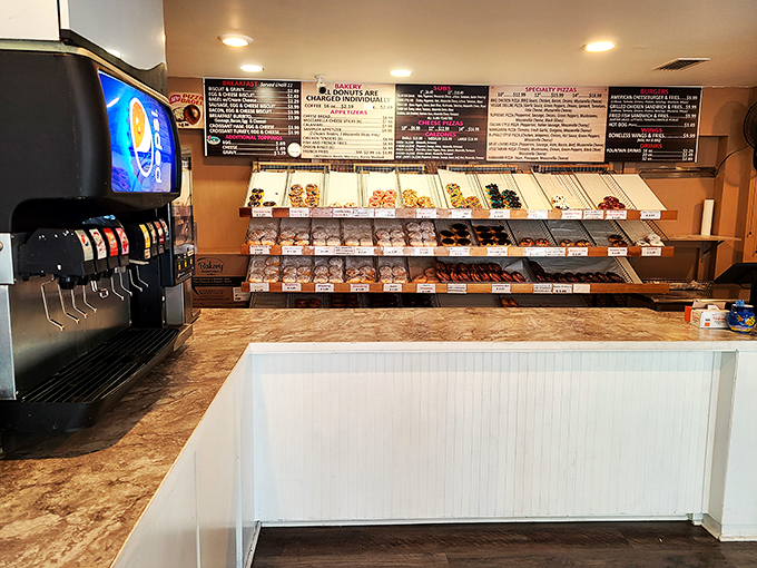 Decisions, decisions! This donut display is the adult version of being a kid in a candy store.