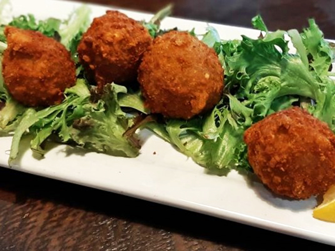 Crab bombs away! These crispy spheres of seafood delight are like tasty cannonballs in the battle against boring meals. Victory never tasted so good!