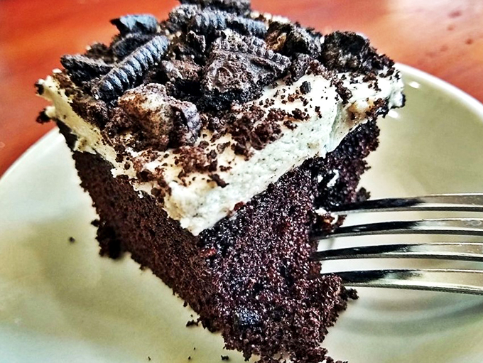 A slice of chocolate heaven that's darker than a Michigan winter night. This Oreo cake is the sweet ending every meal deserves.