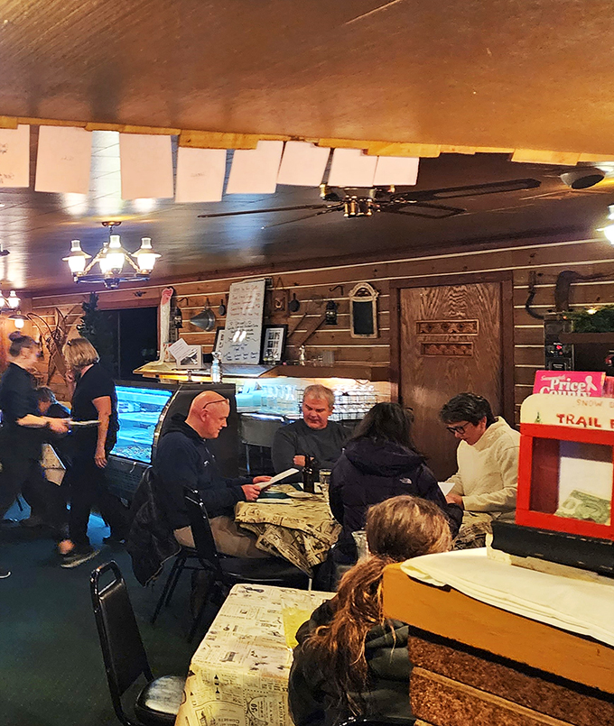 A slice of Americana, served with a side of laughter. These diners know the secret to happiness: good food and even better company.