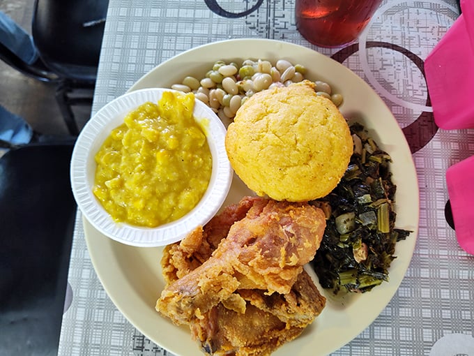 Southern hospitality on a plate! This fried chicken dinner is crunchier than your dad's favorite vinyl records and twice as satisfying. Photo credit: Conrad Carriker
