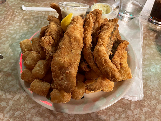 Lake-to-plate perfection! These golden-brown perch fillets are so fresh, they might just swim off your plate if you're not quick enough.