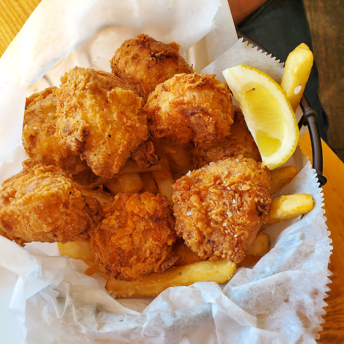 Fried shrimp that's crunchier than walking on fall leaves. Paired with crispy fries and a lemon wedge, it's a basket of golden happiness.