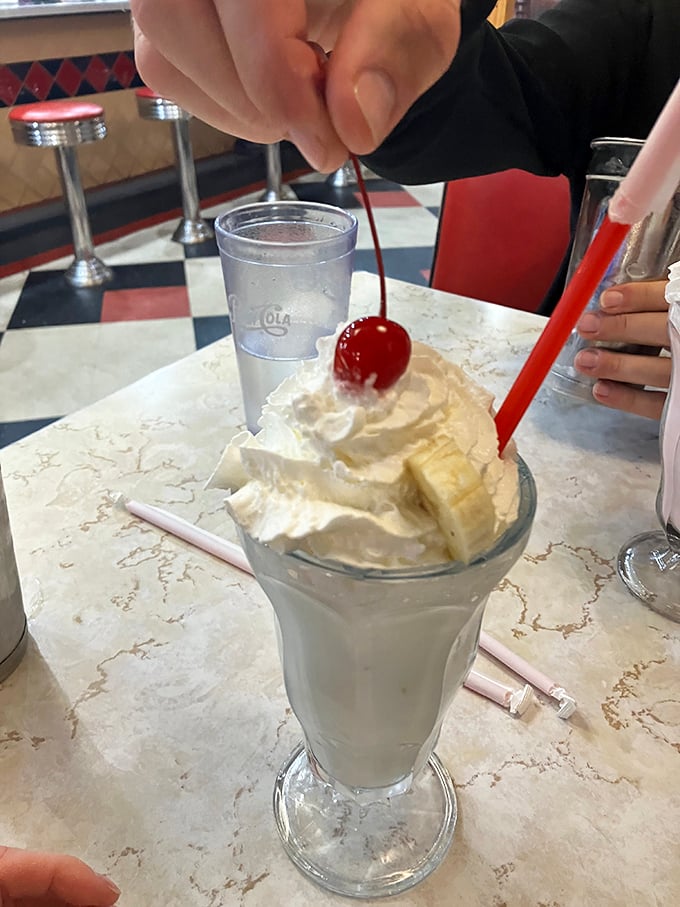 The cherry on top isn't just a saying here! This classic malt is so thick, your straw might need a gym membership.