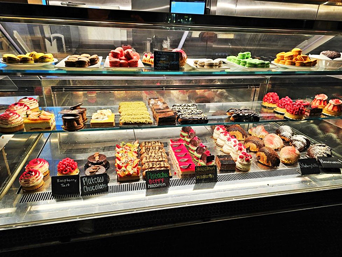 Welcome to pastry paradise! This display case is like a treasure chest for your taste buds. Good luck choosing just one&mdash;I dare you to try!
