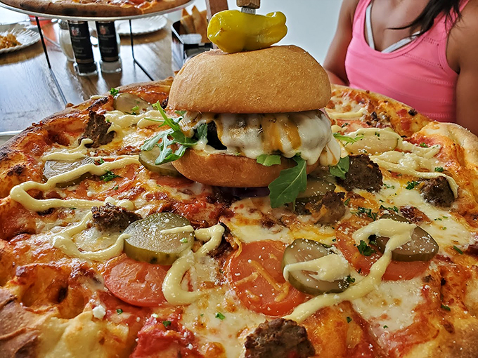 Pizza and burger had a baby, and it's glorious. This culinary mash-up is so good, it'll make you question everything you thought you knew about food. Photo credit: JAIME SULLIVAN